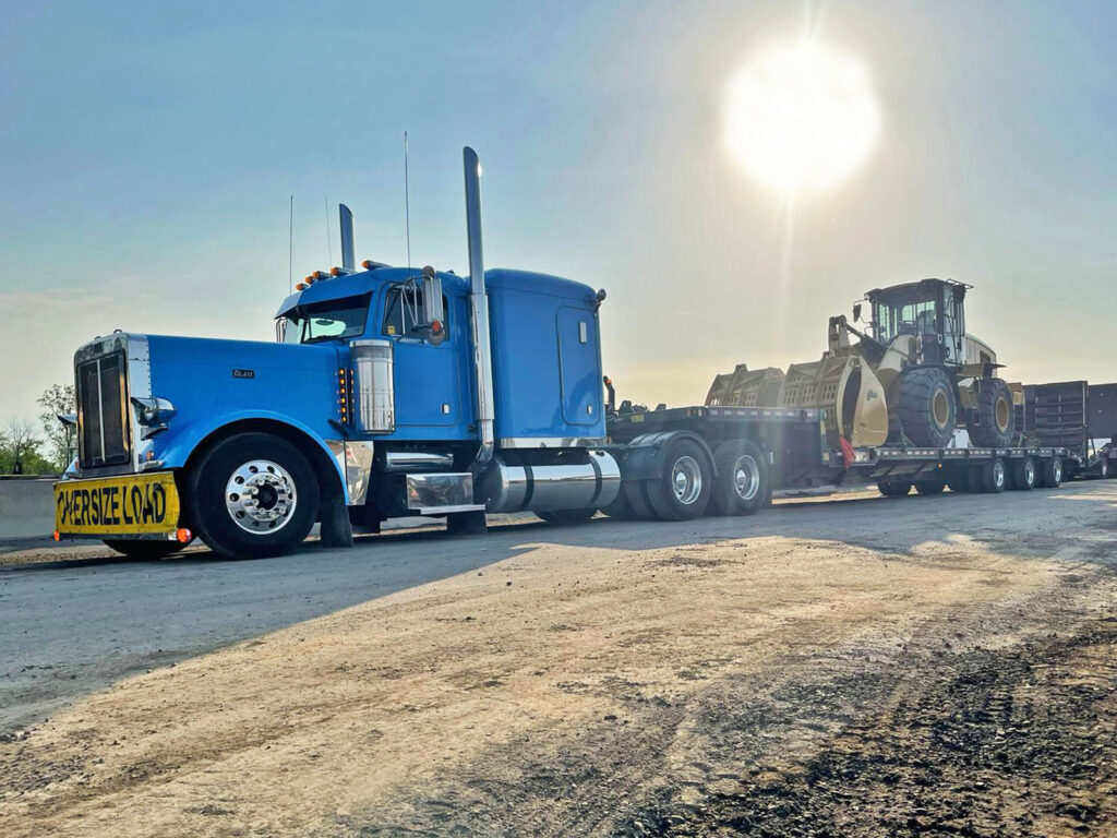 Backhoe Transport - Flatbed Transport, Trucking, LTL, FTL